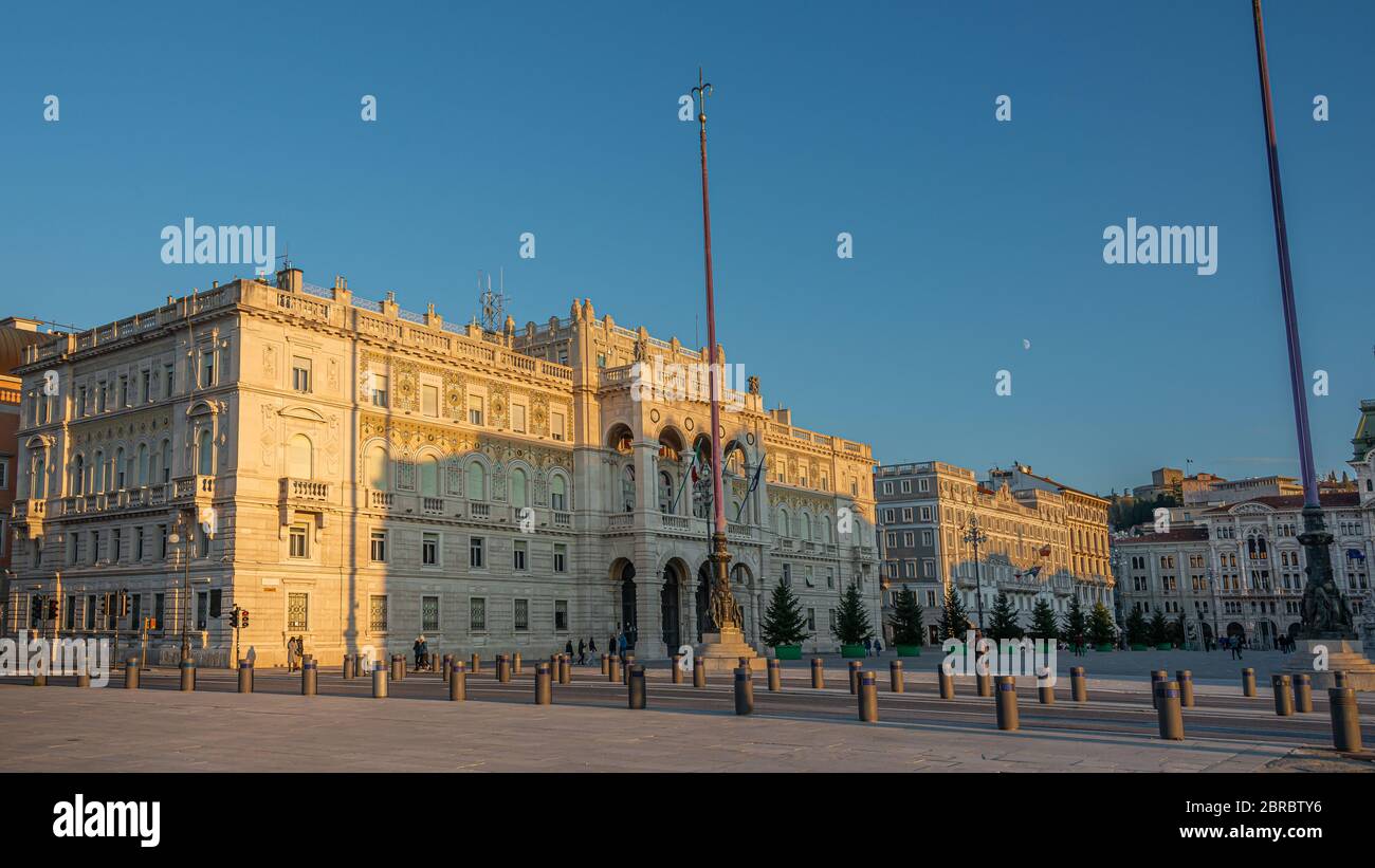 The piazza Unita at Trieste city, Italy at sunset. The square is also ...