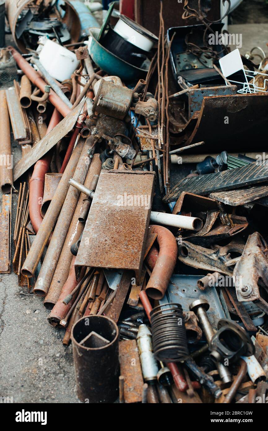 Scrap metal. Rust under a coat of paint. Peeled off white paint ...