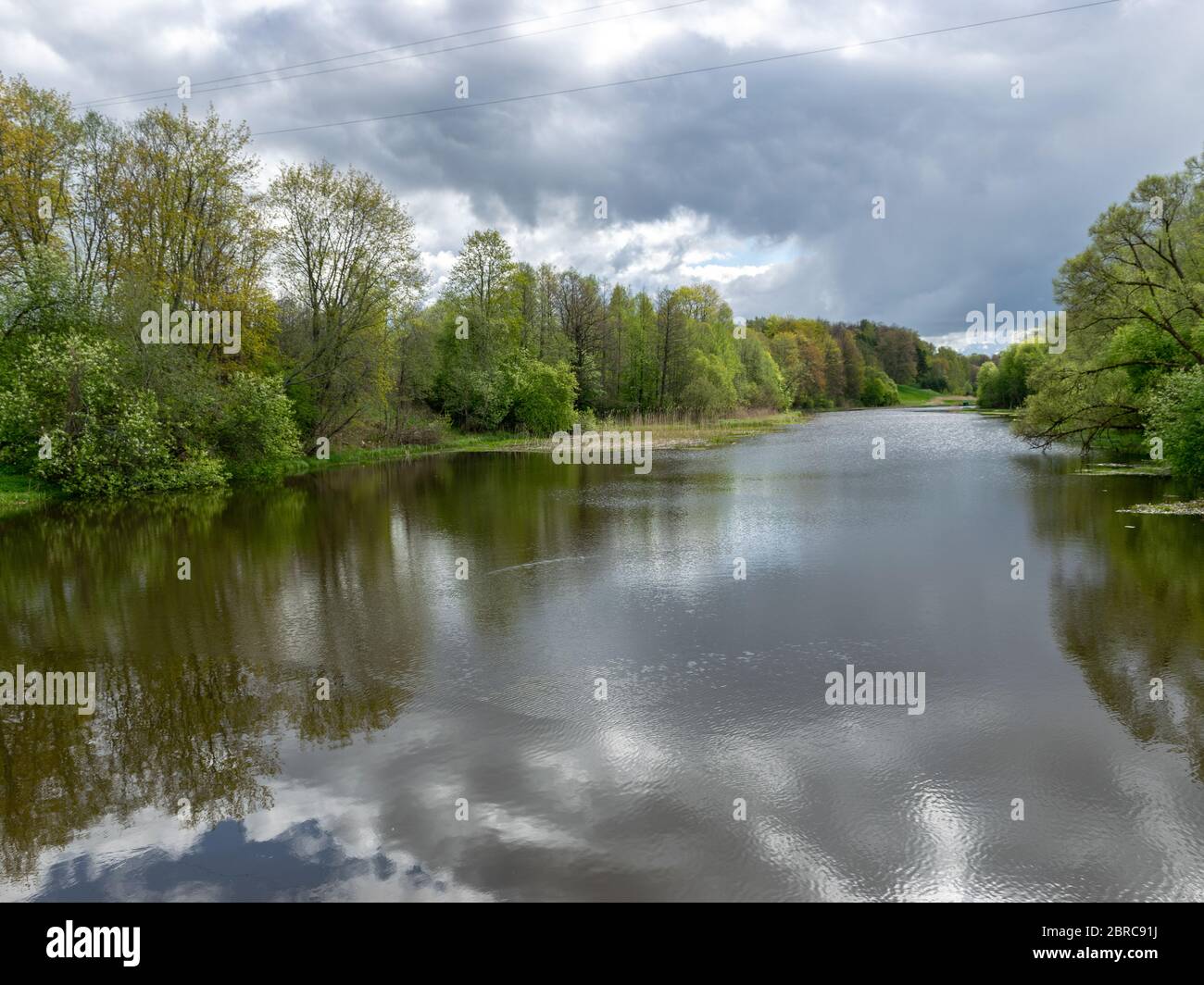 beautiful spring landscape with a river, the first bright spring ...