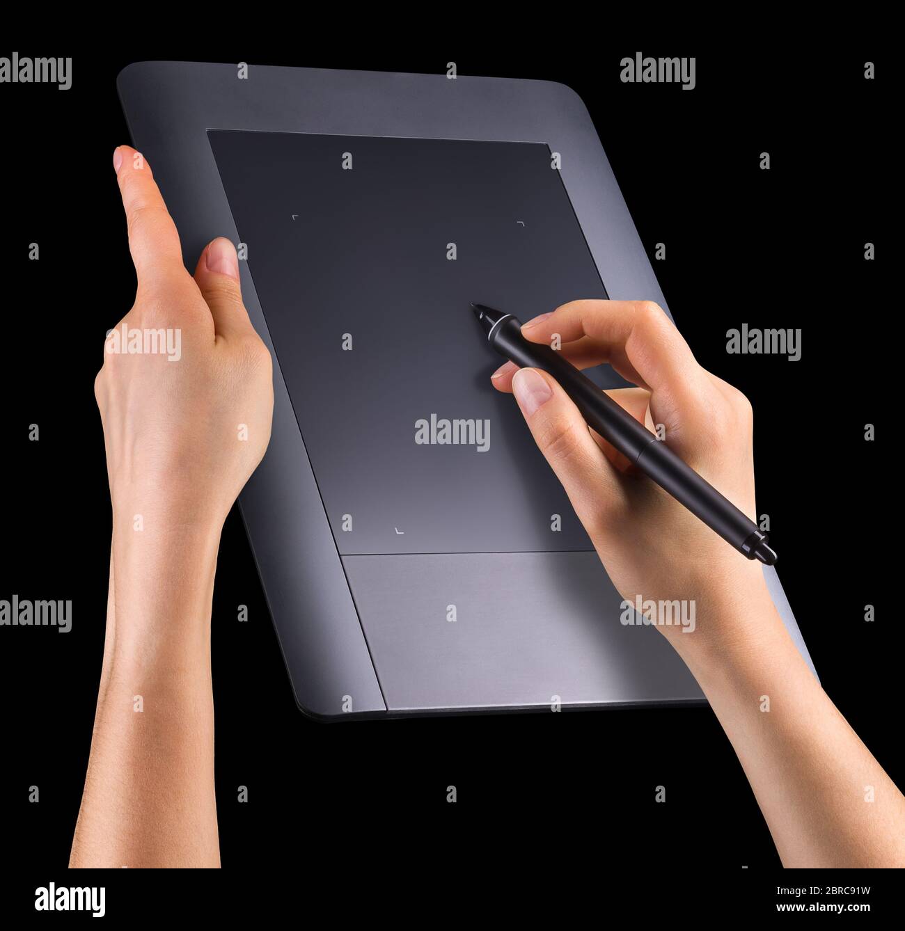 Hand holding digital graphic pen and drawing graphic tablet isolated on ...