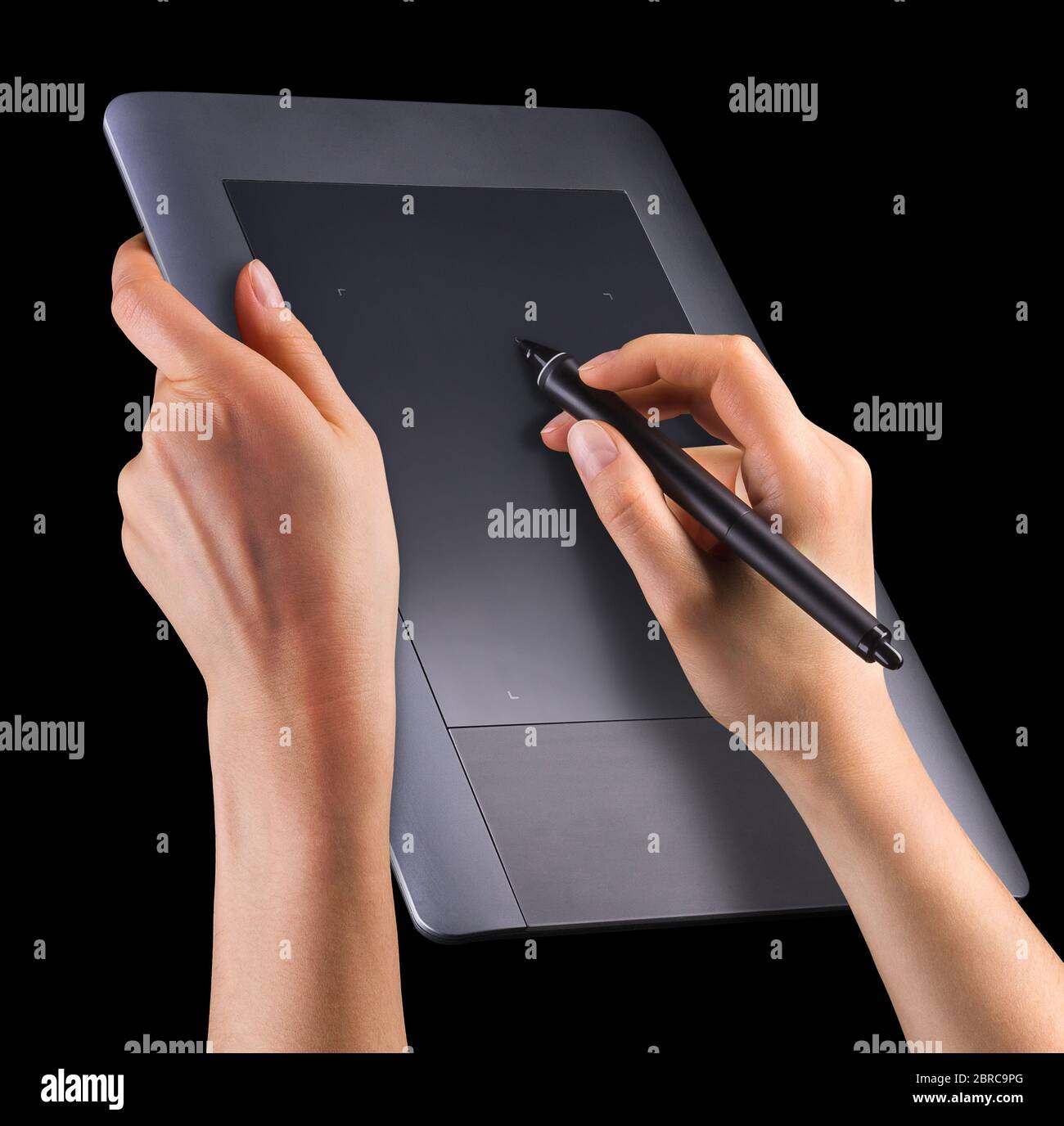 Hand holding digital graphic pen and drawing graphic tablet isolated on ...