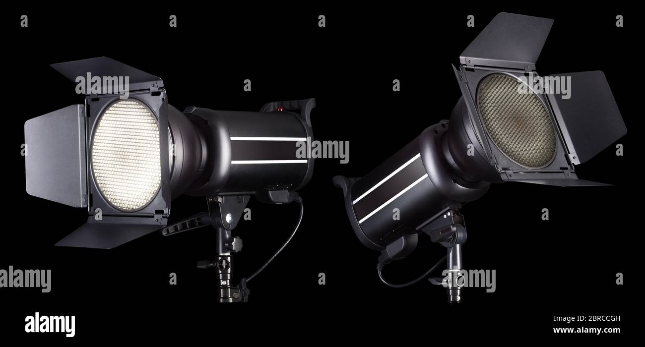 Set of photography studio flash isolated on black background with lamp ...
