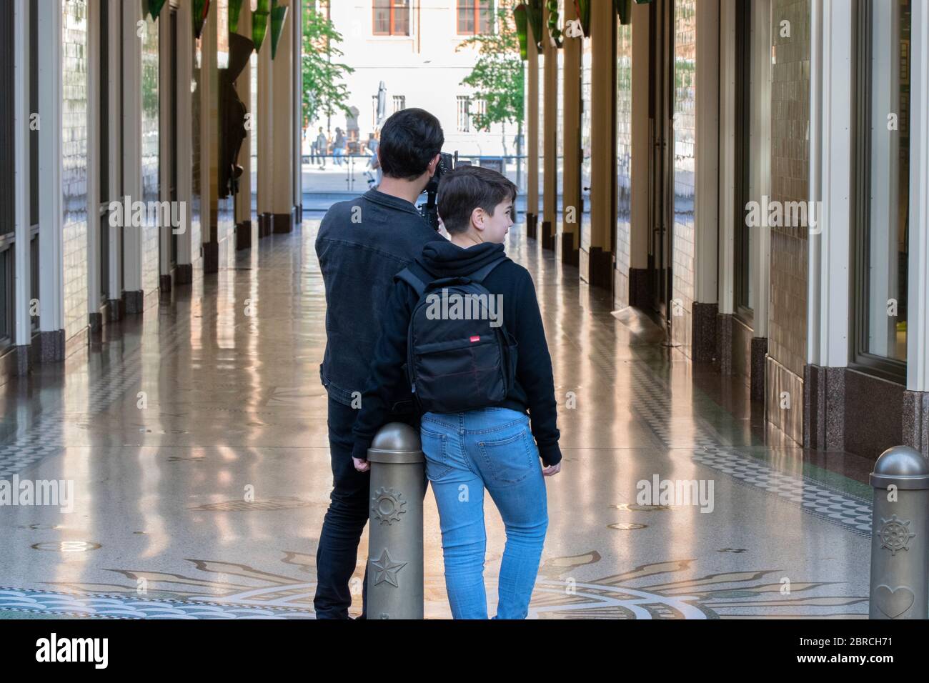 Boy filming friends hi-res stock photography and images - Alamy