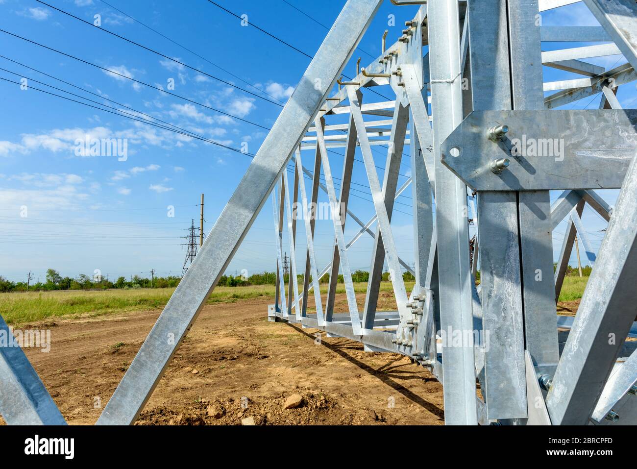 High voltage electric pillar from under. A high-voltage electricity ...