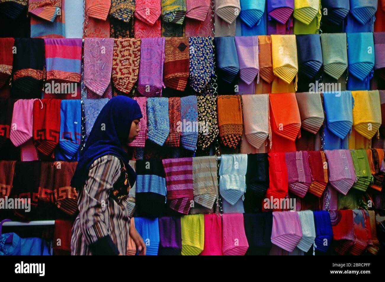 A street side shop of hijab (Islamic womens veil), one of small-scale ...
