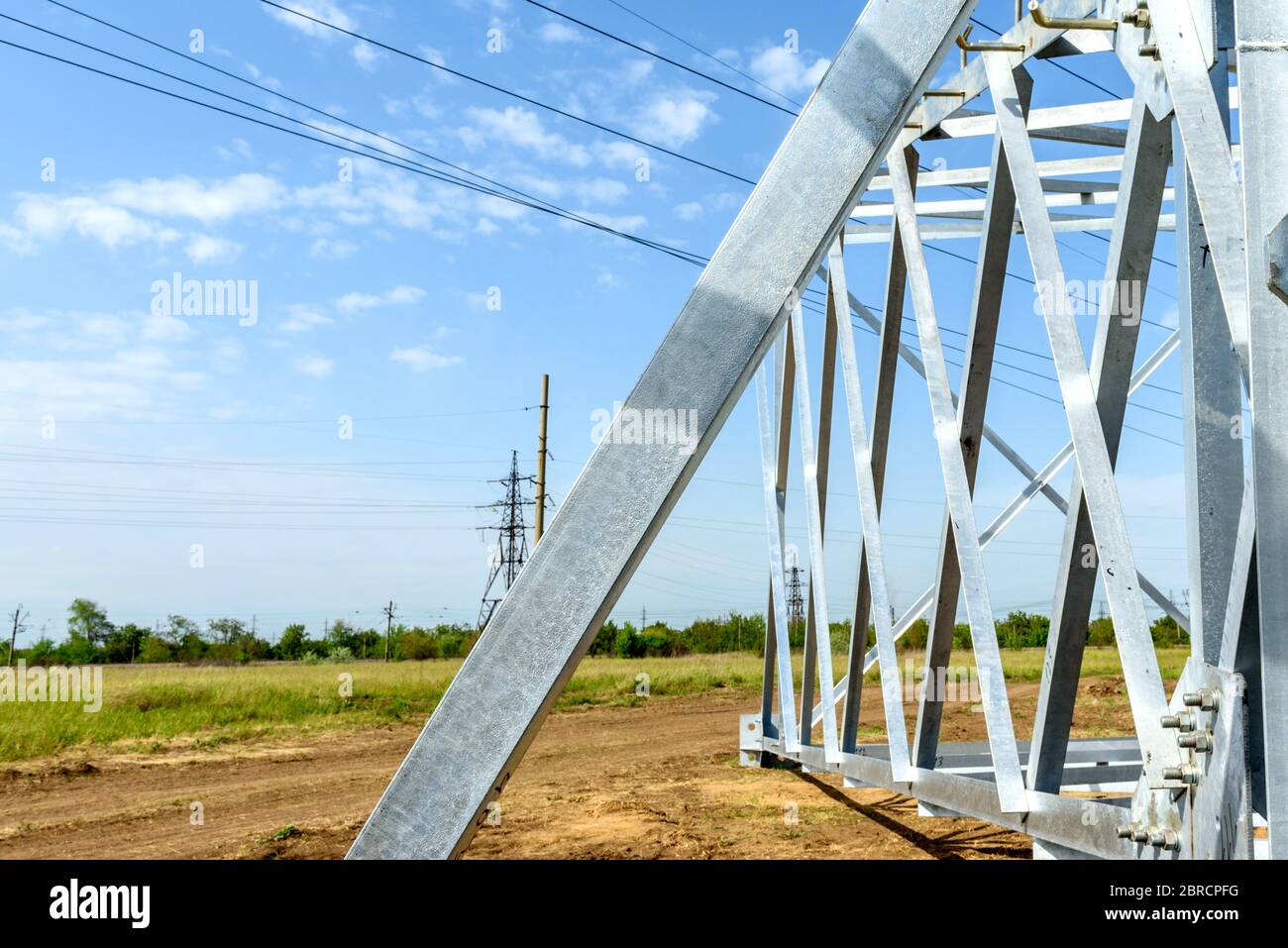 High voltage electric pillar from under. A high-voltage electricity ...