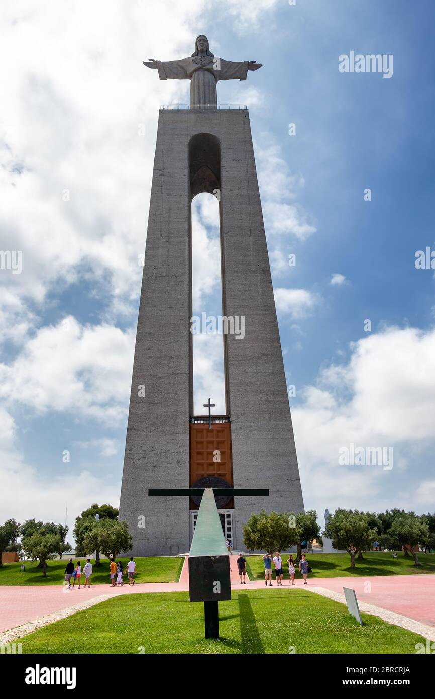 Sanctuary of Christ the King overlooking the Lisbon in a cloudy day ...