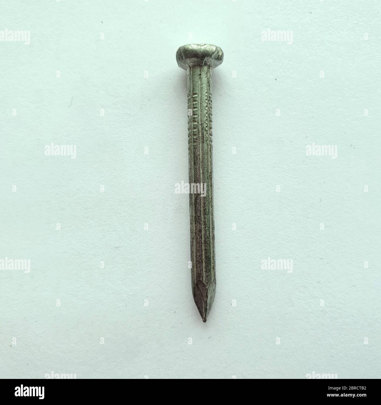Cement screw keel on paper. Used for cemented walls Stock Photo - Alamy