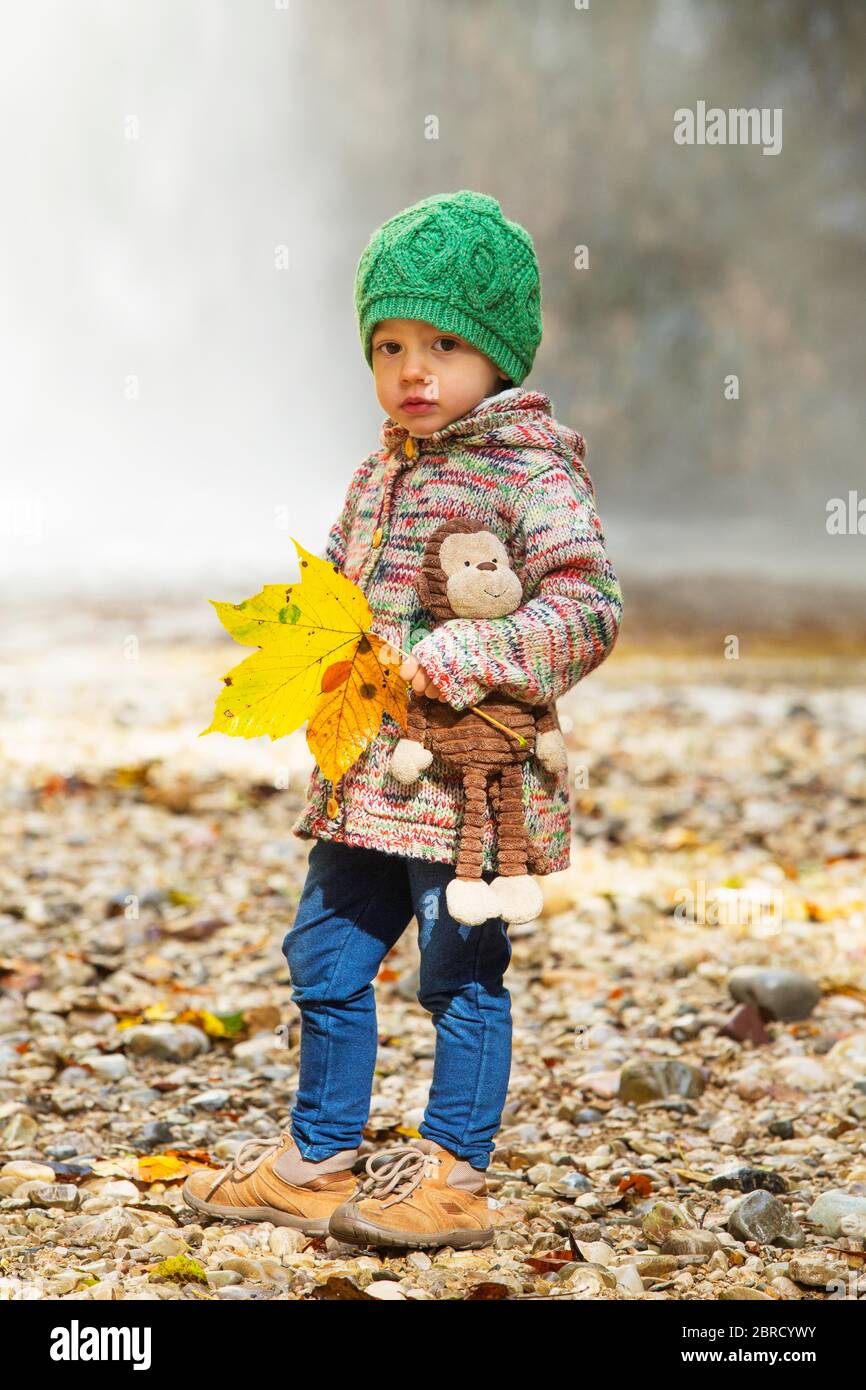 Little girl on an autumn hike with cuddly toy, Austria Stock Photo - Alamy