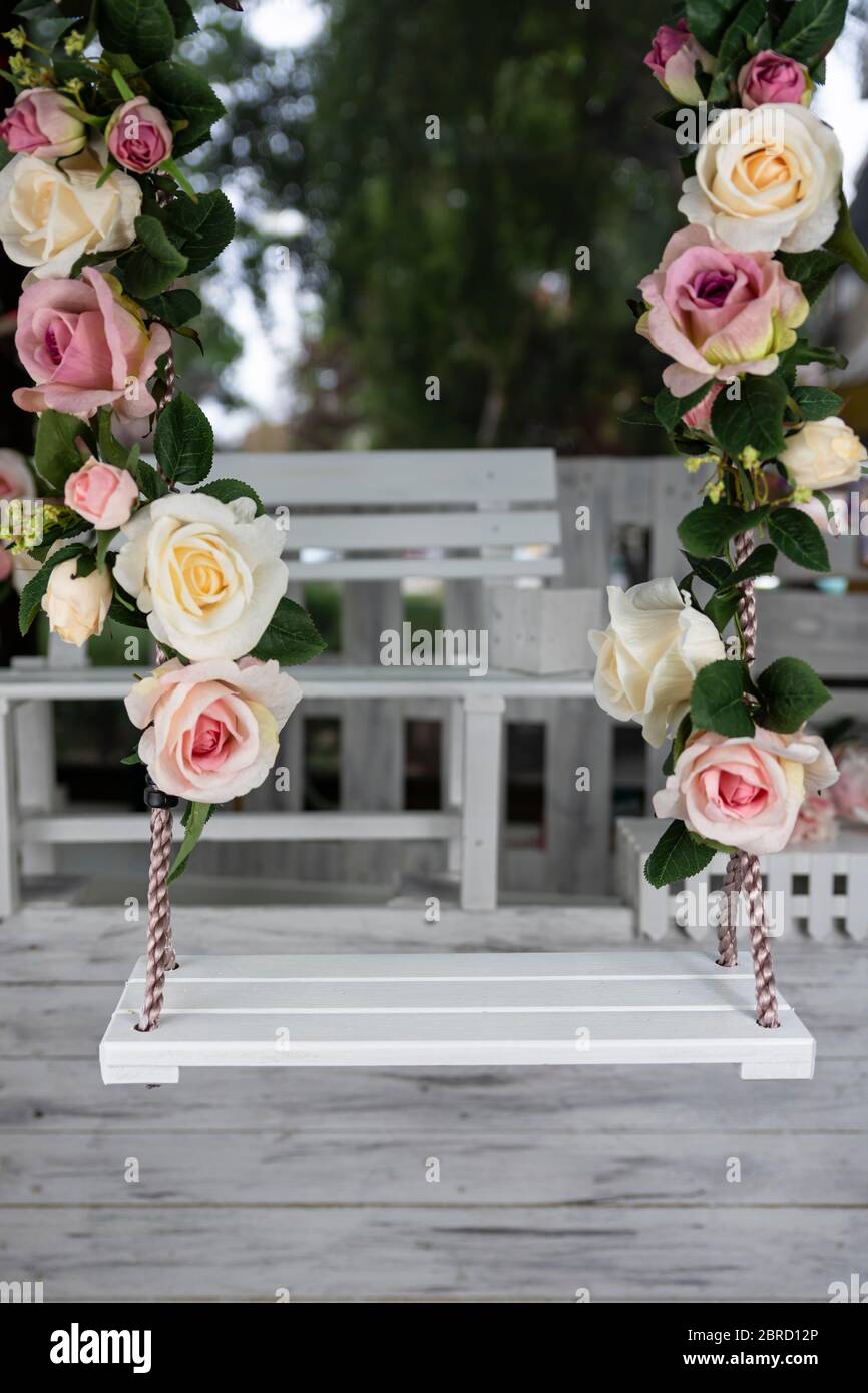 Flower decorated swing hi-res stock photography and images - Alamy