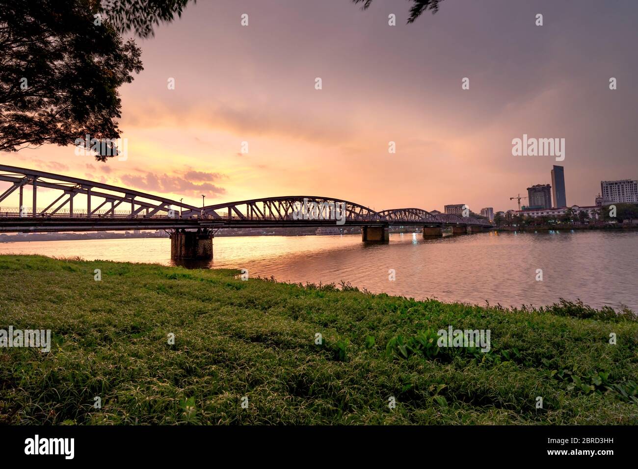 Panoramic photo of Trang Tien Bridge in Hue at sunrise. Truong Tien ...