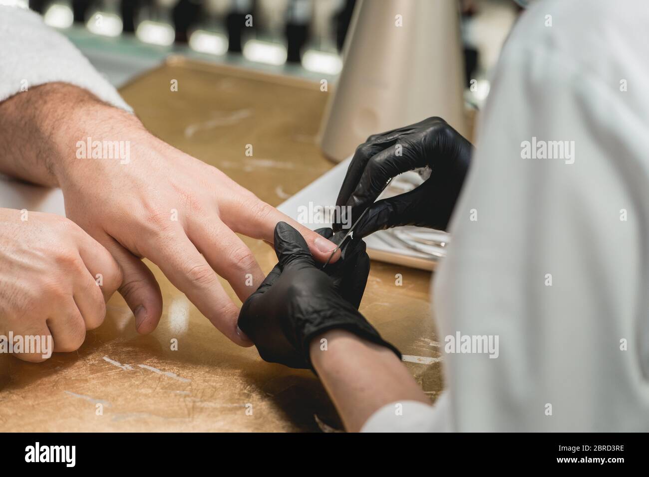 Manicure master during professional hardware hi-res stock photography ...