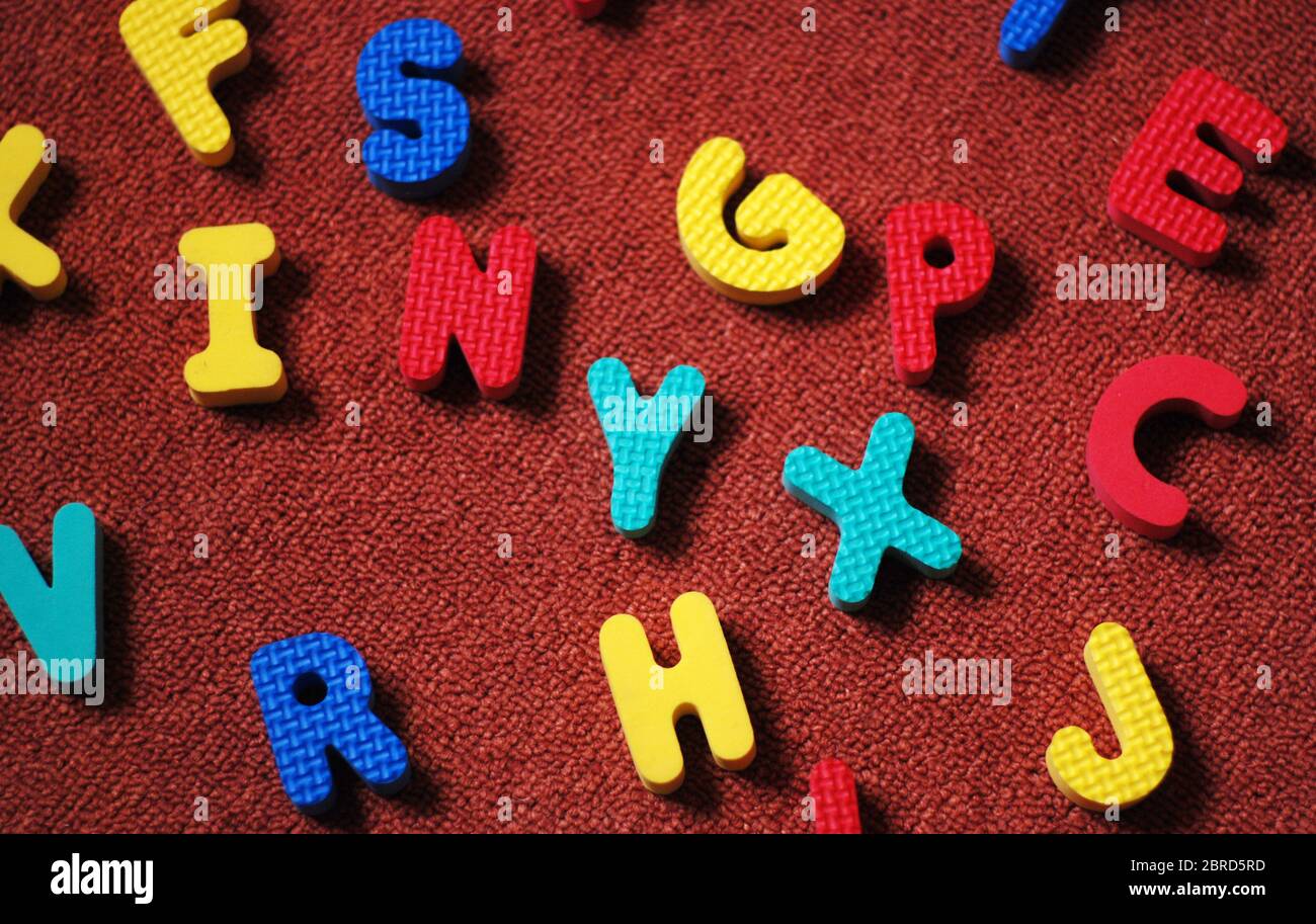 close up abc letters lying on a carpet Stock Photo - Alamy