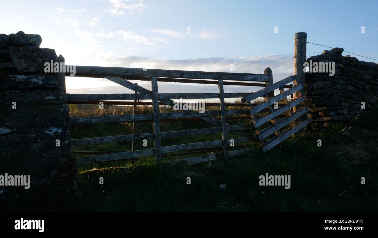 Gate and dry stone walls Stock Photo - Alamy