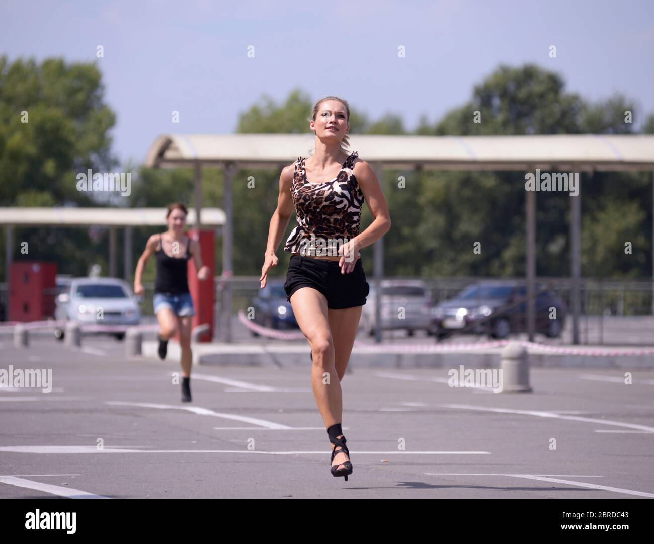 High heel race hi-res stock photography and images - Alamy