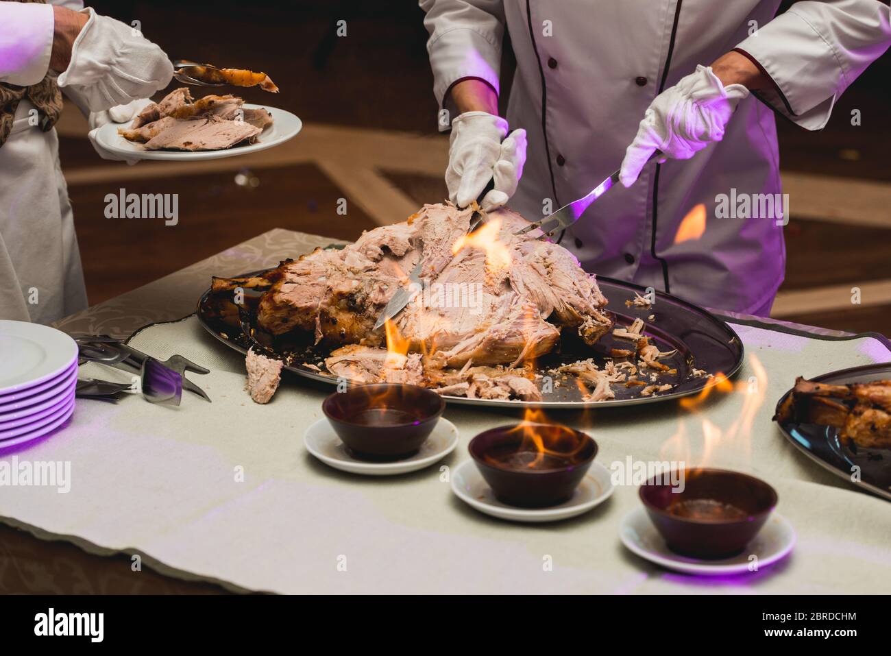 appetizing grilled meat on fire close-up. beautiful presentation of the ...