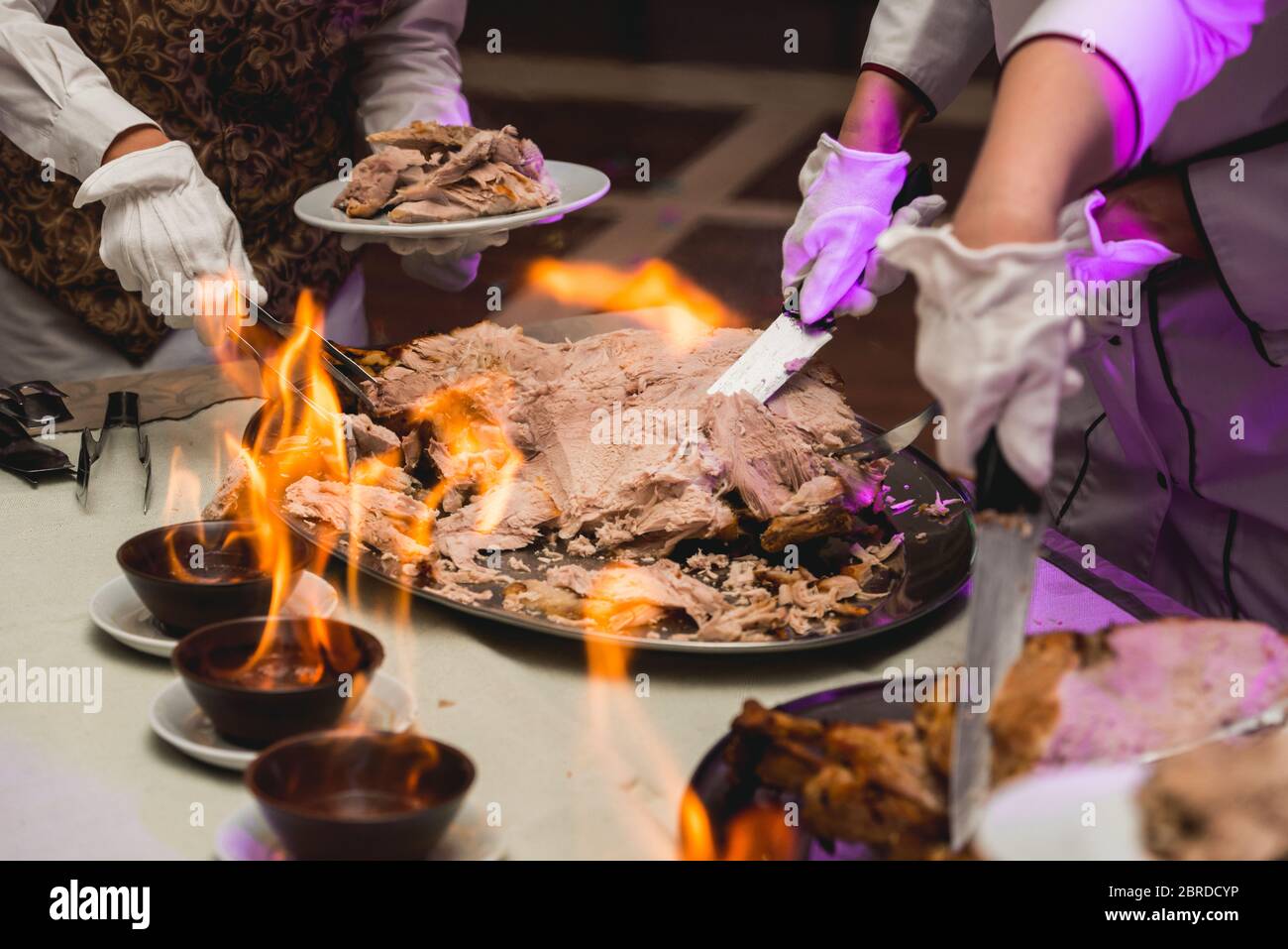 appetizing grilled meat on fire close-up. beautiful presentation of the ...