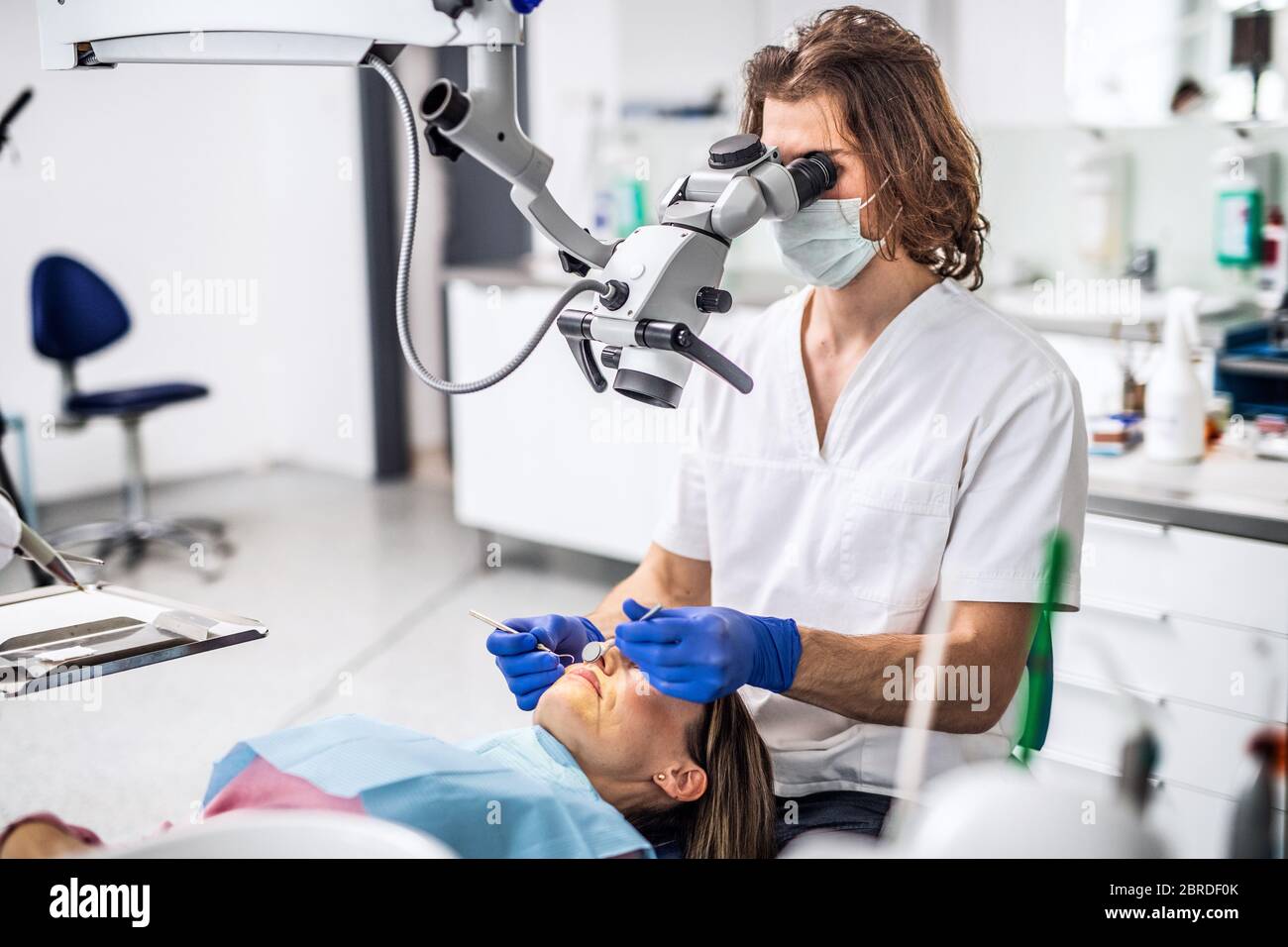 A woman has a dental check-up in dentist surgery Stock Photo - Alamy