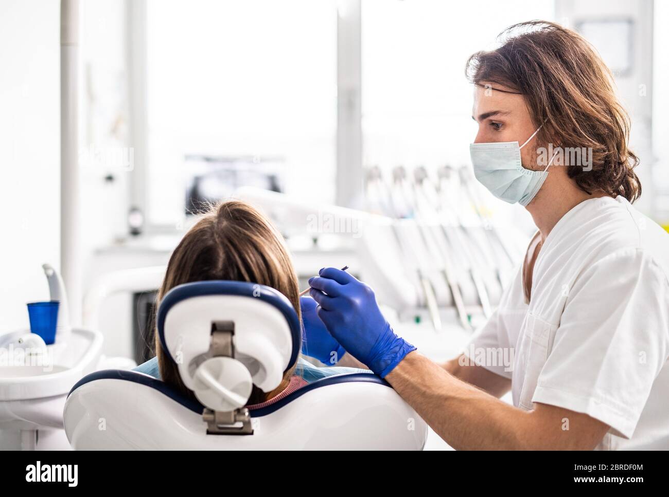 A dental check-up of patient in dentist surgery Stock Photo - Alamy