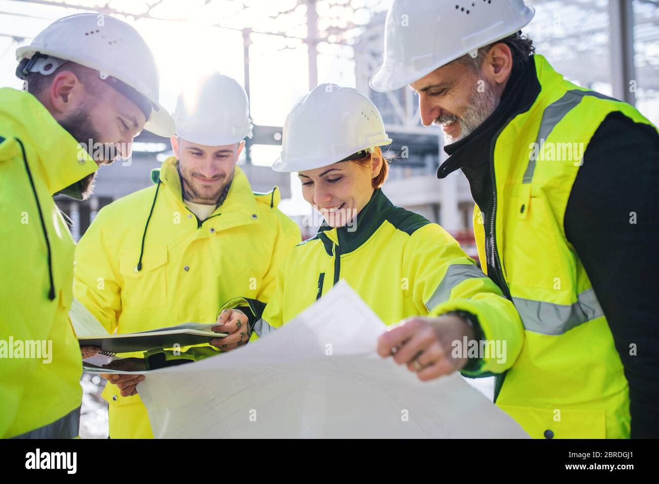 Engineers working blueprints hi-res stock photography and images - Alamy