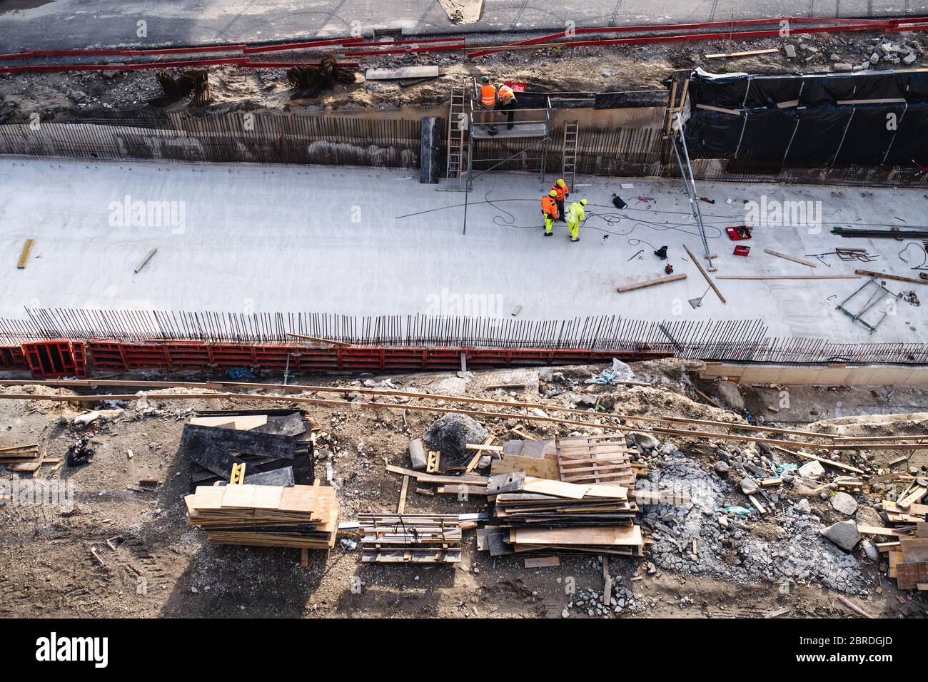 Aerial view of group of workers on construction site, working Stock ...