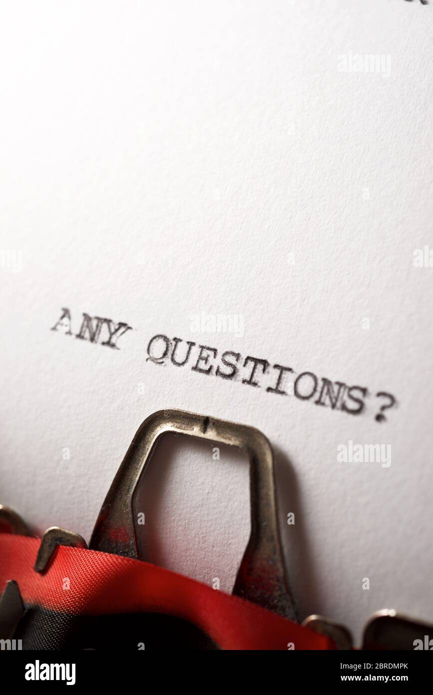 Any questions? text written with a typewriter Stock Photo - Alamy