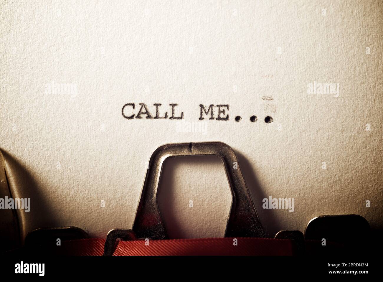 Call me text written with a typewriter Stock Photo - Alamy