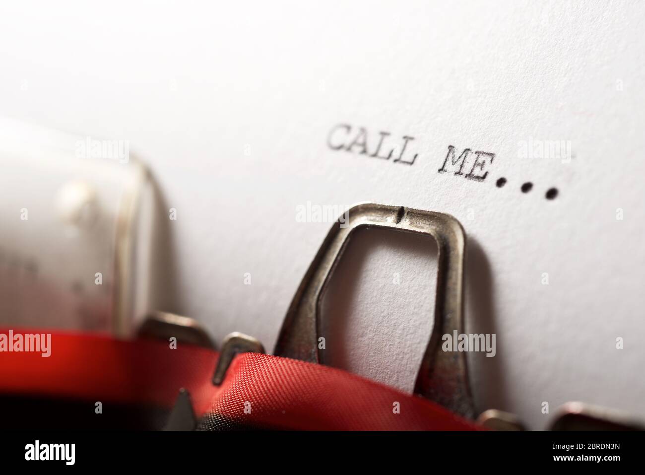 Call me text written with a typewriter Stock Photo - Alamy