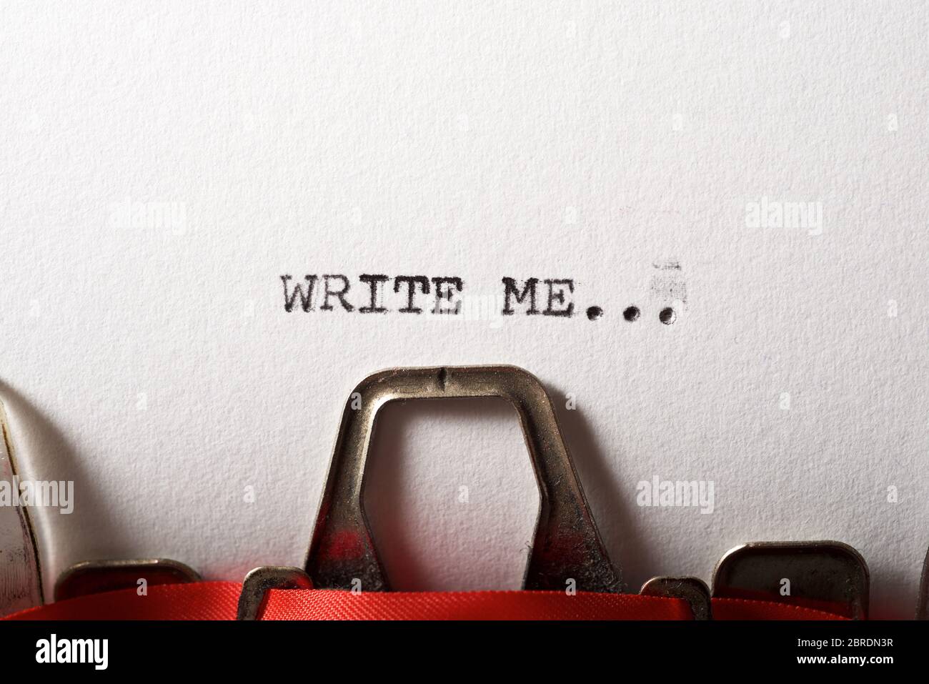 Write me... text written with a typewriter Stock Photo - Alamy