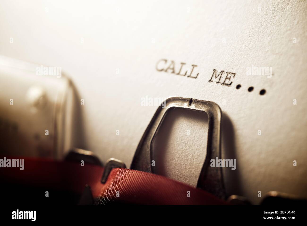 Call me text written with a typewriter Stock Photo - Alamy