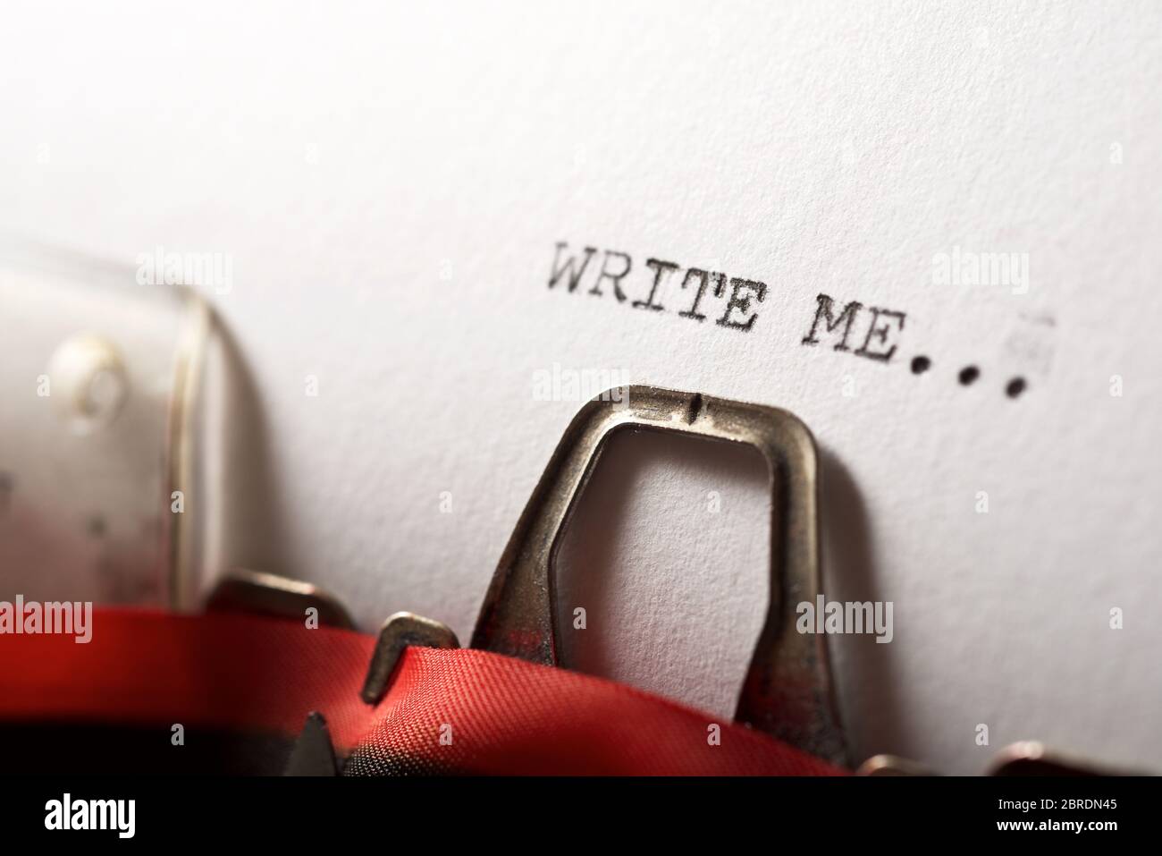 Write me... text written with a typewriter Stock Photo - Alamy