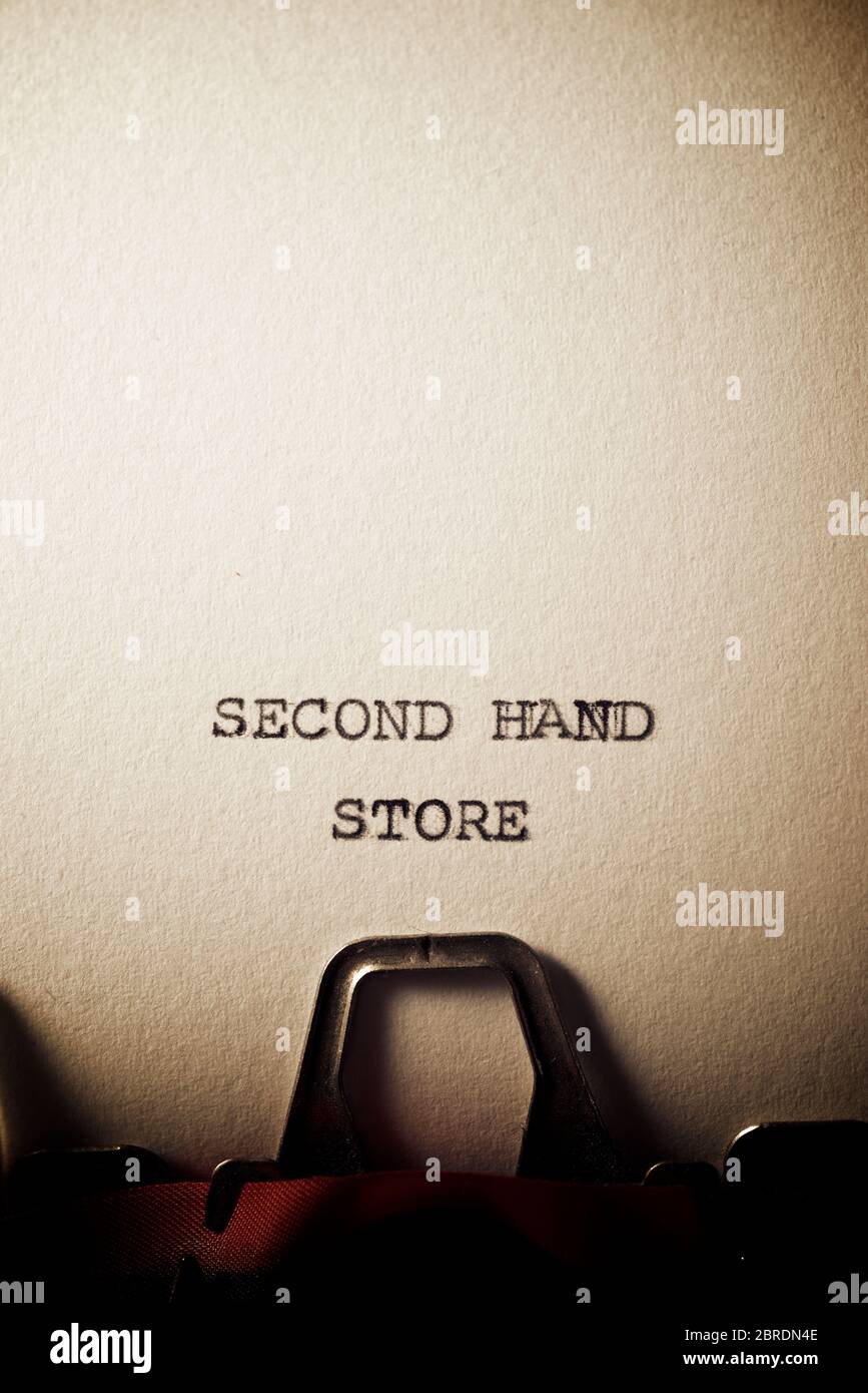 Second hand store written with a typewriter Stock Photo - Alamy