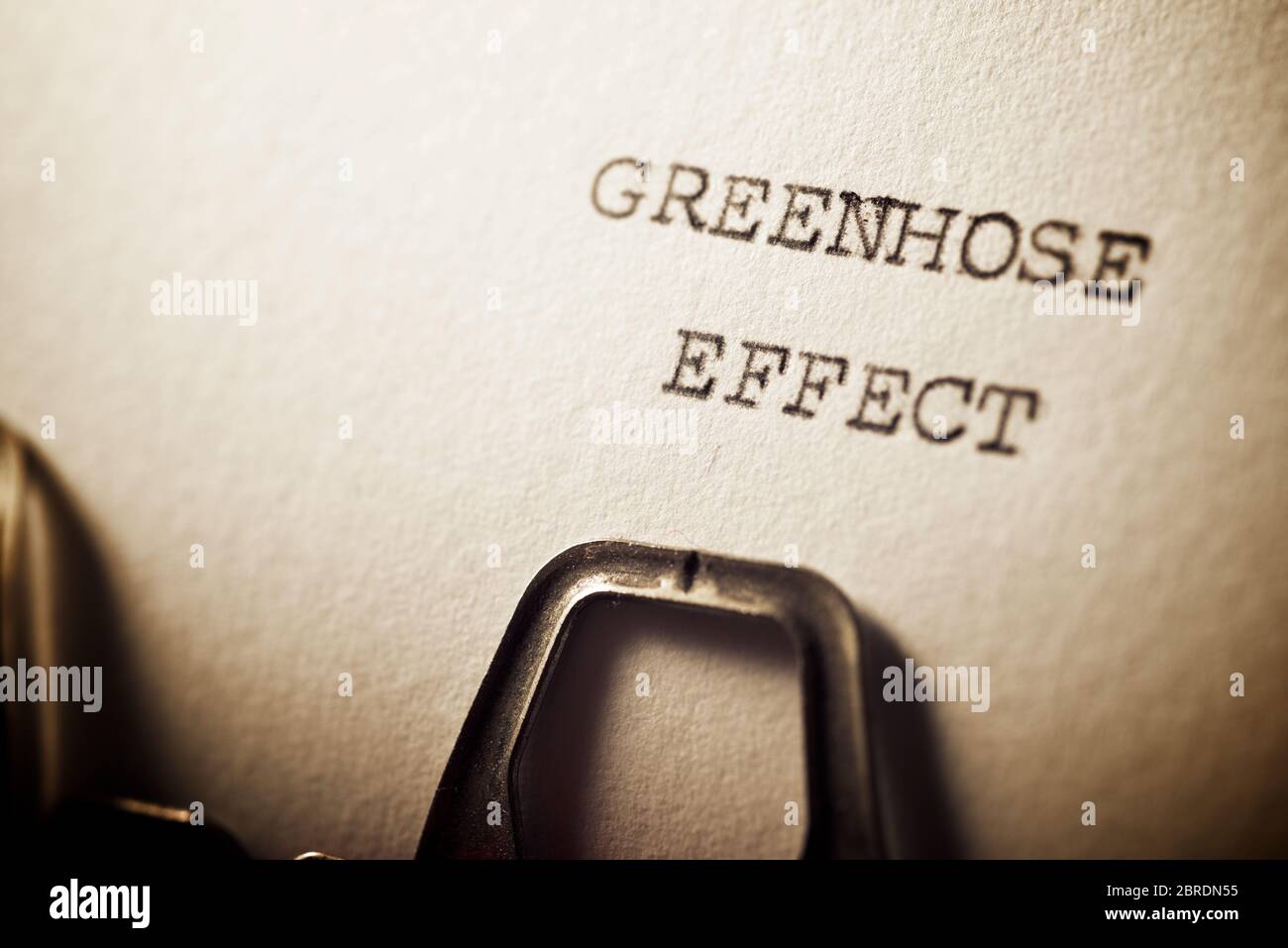 Greenhouse effect text written with a typewriter Stock Photo - Alamy