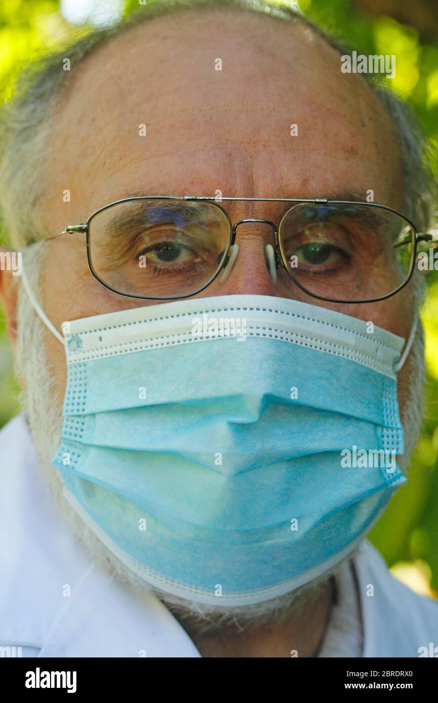 Old man with mask Stock Photo - Alamy