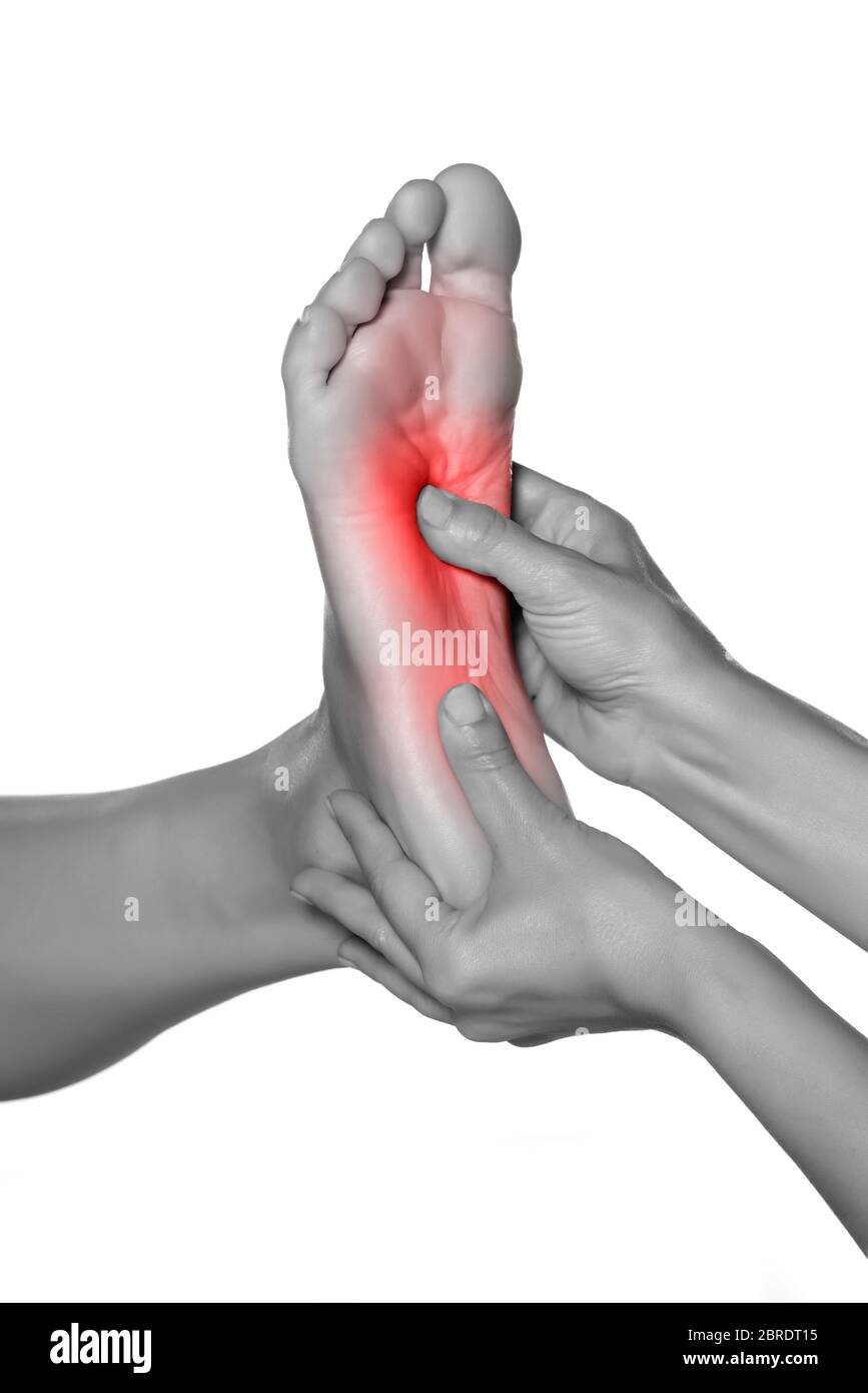 foot massage on white background Stock Photo - Alamy