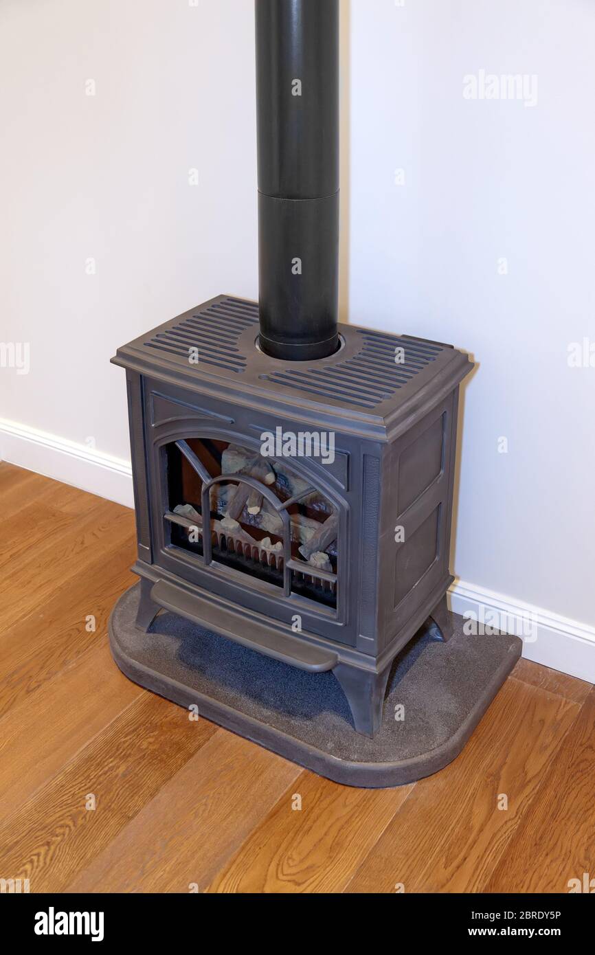 Old fashioned wood fireplace Stock Photo - Alamy