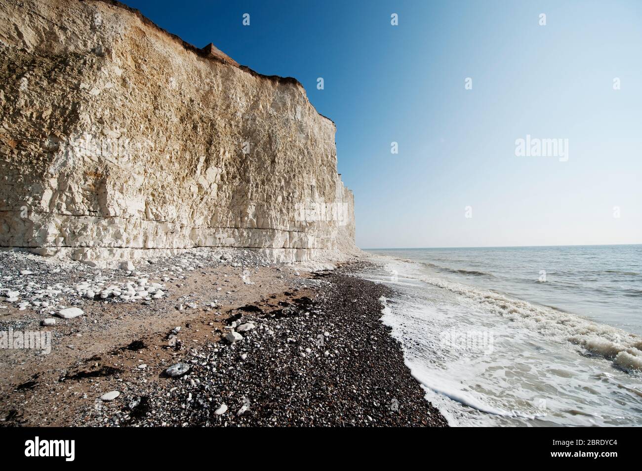 Eroded vertical chalk sea cliffs at Birling Gap near Beachy Head ...
