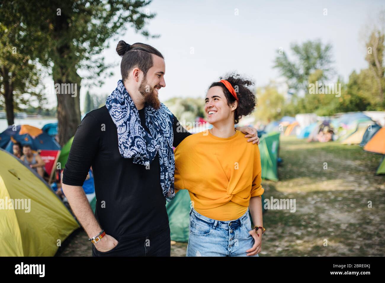 Females walking arm in arm hi-res stock photography and images - Alamy