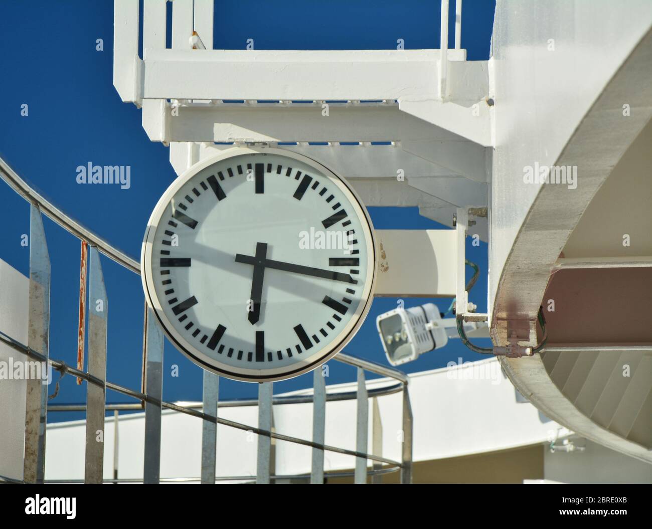The clock on cruise ship deck Stock Photo - Alamy