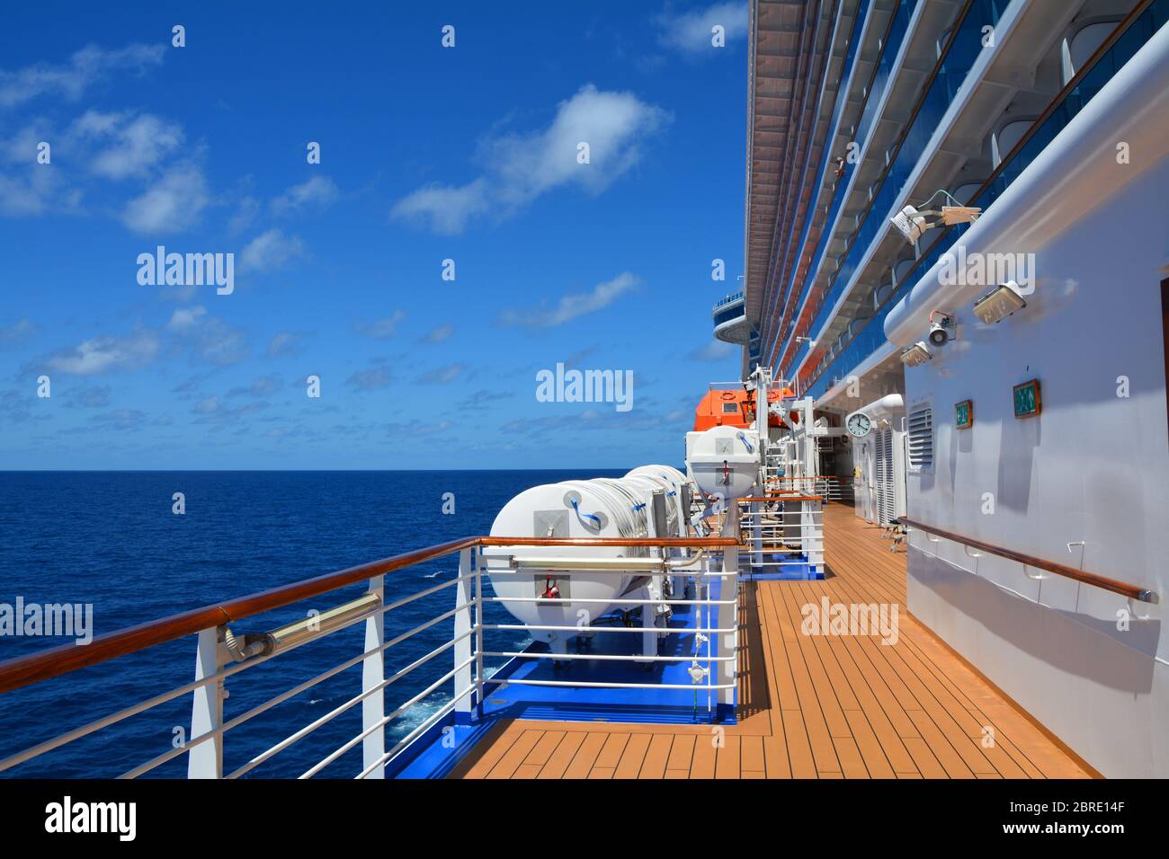 Open deck on huge cruise ship sailing on the Caribbean sea Stock Photo ...