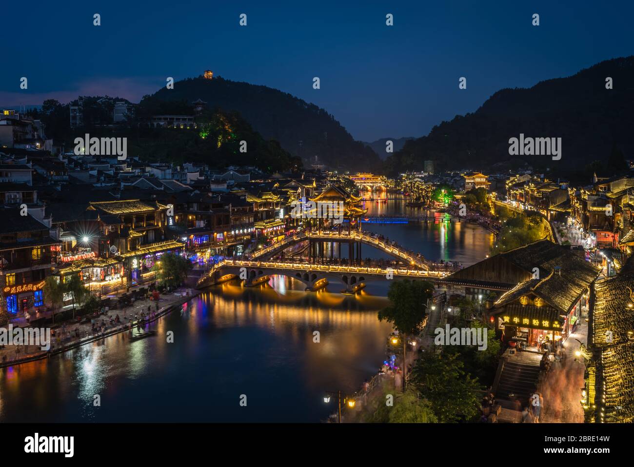 Feng Huang, China - August 2019 : Illuminated at night old historic ...