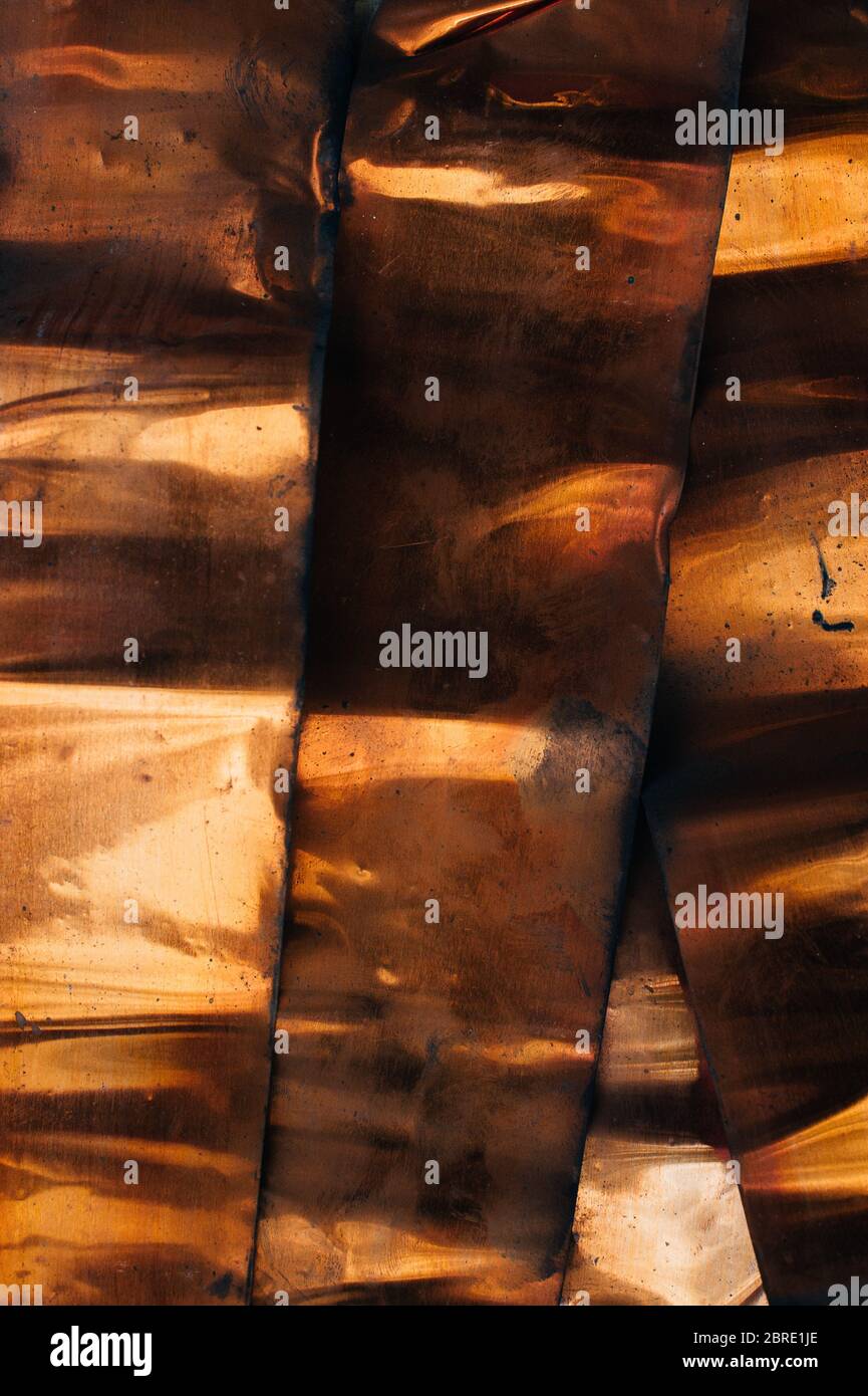 Copper scrap metal, copper sheets. Copper texture. Close-up. Macro ...