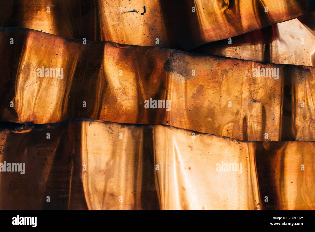 Copper scrap metal, copper sheets. Copper texture. Close-up. Macro ...