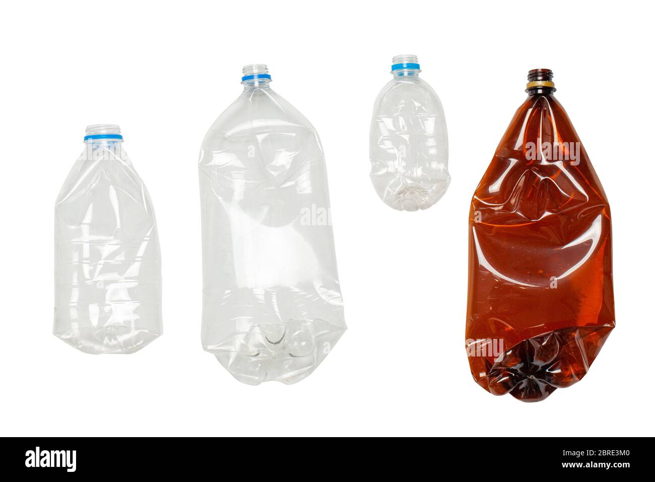 Crumpled plastic bottles isolated on white background Stock Photo - Alamy