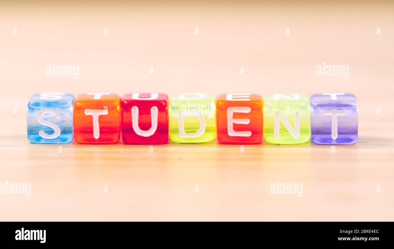 STUDENT word written on color block. STUDENT text on table, concept ...