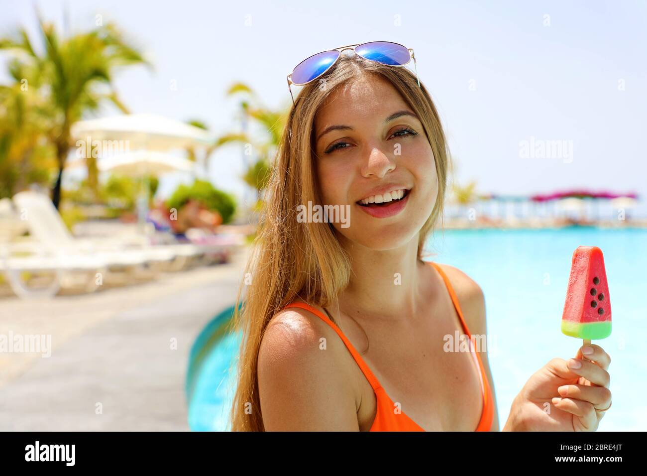 Very Pretty Girl Eating Popsicle Ice Pop In Form Of Watermelon Slice