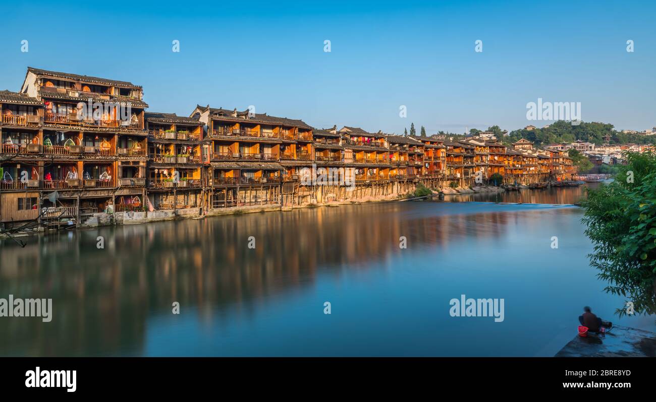Feng Huang, China - August 2019 : Traditional old wooden stilted houses ...