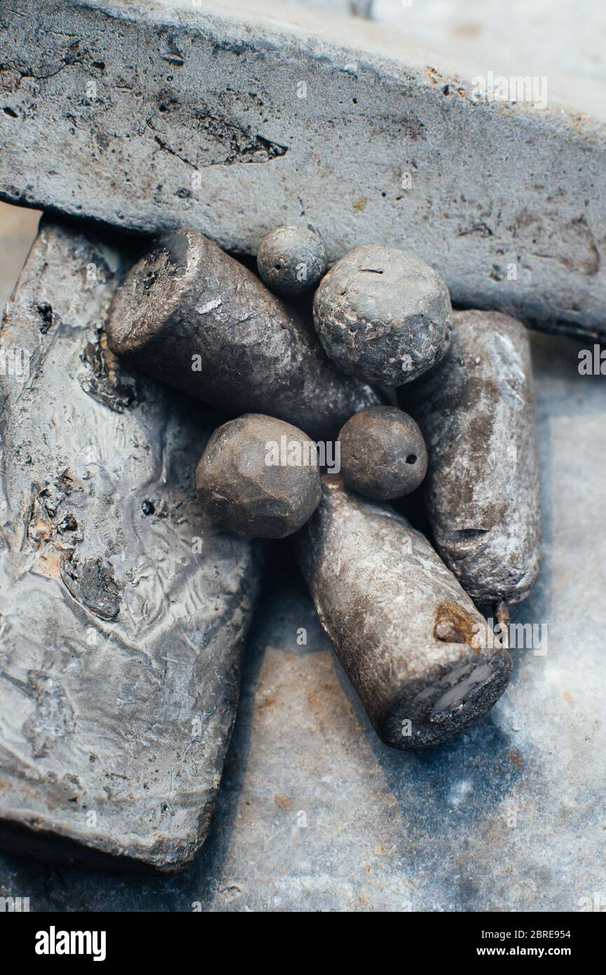 Scrap lead, pieces, lead bars. Lead texture. Close-up. Macro. Plumbum ...