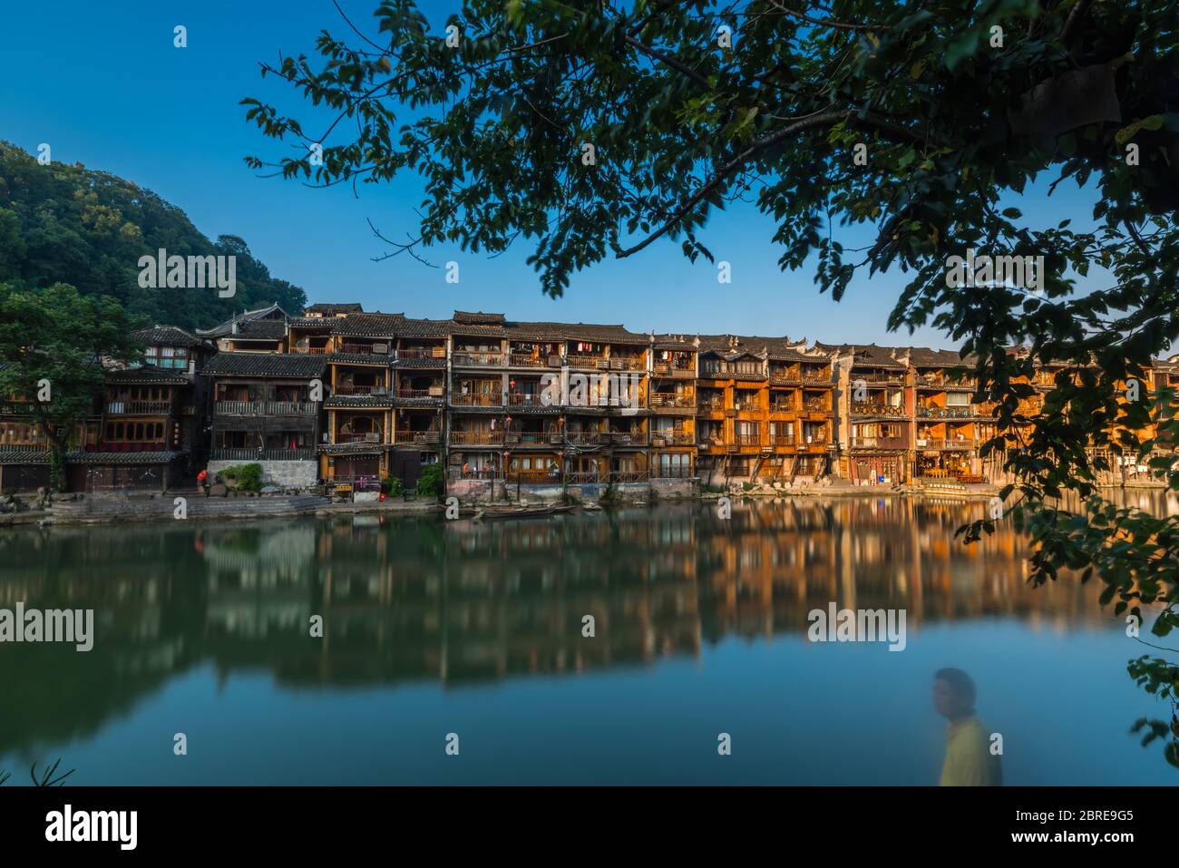 Feng Huang, China - August 2019 : Traditional old wooden stilted houses ...