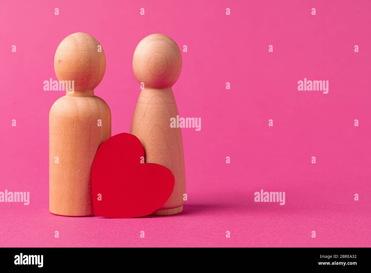 Small wooden figures of family members. Family relationship symbol ...